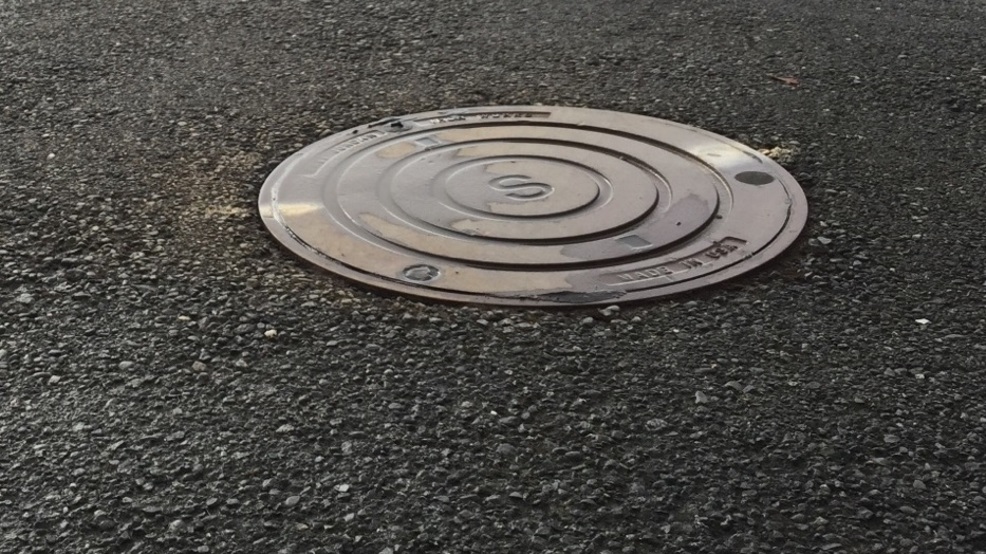 Heavy rain causes sewage overflow at Broadway St. manhole in Coos Bay ...
